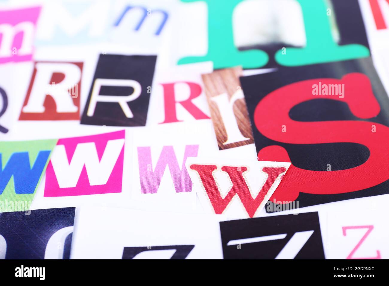 Colorful newspaper letters as background Stock Photo - Alamy