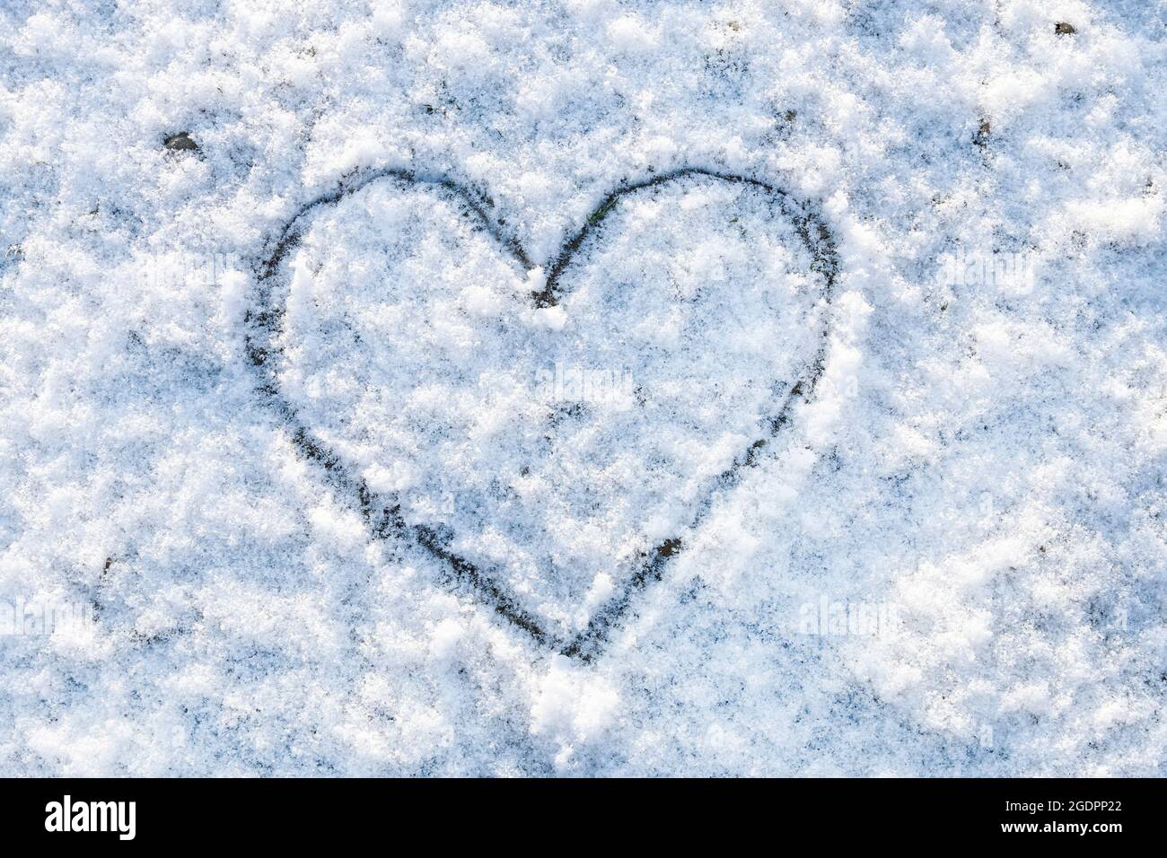 Heart handwritten on snow. Love symbol in winter. Graphic resources ...