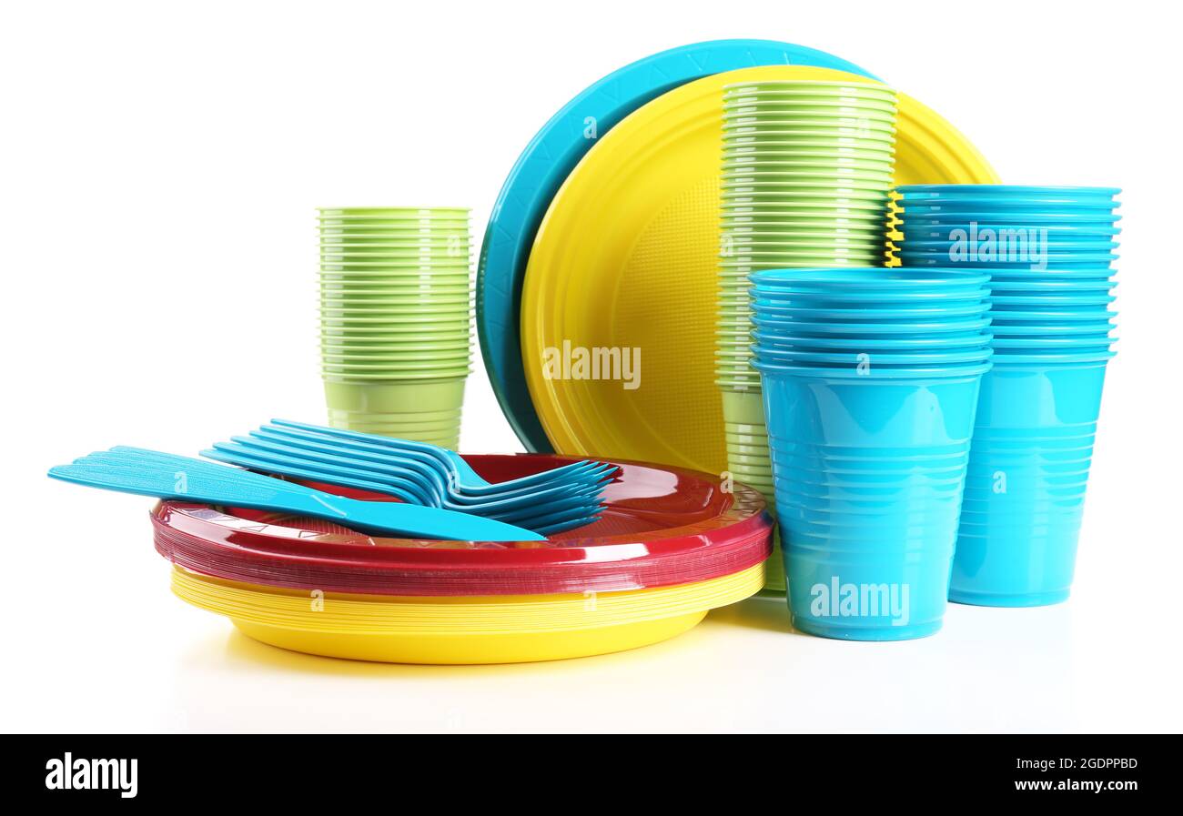 Bright plastic disposable tableware isolated on white Stock Photo - Alamy