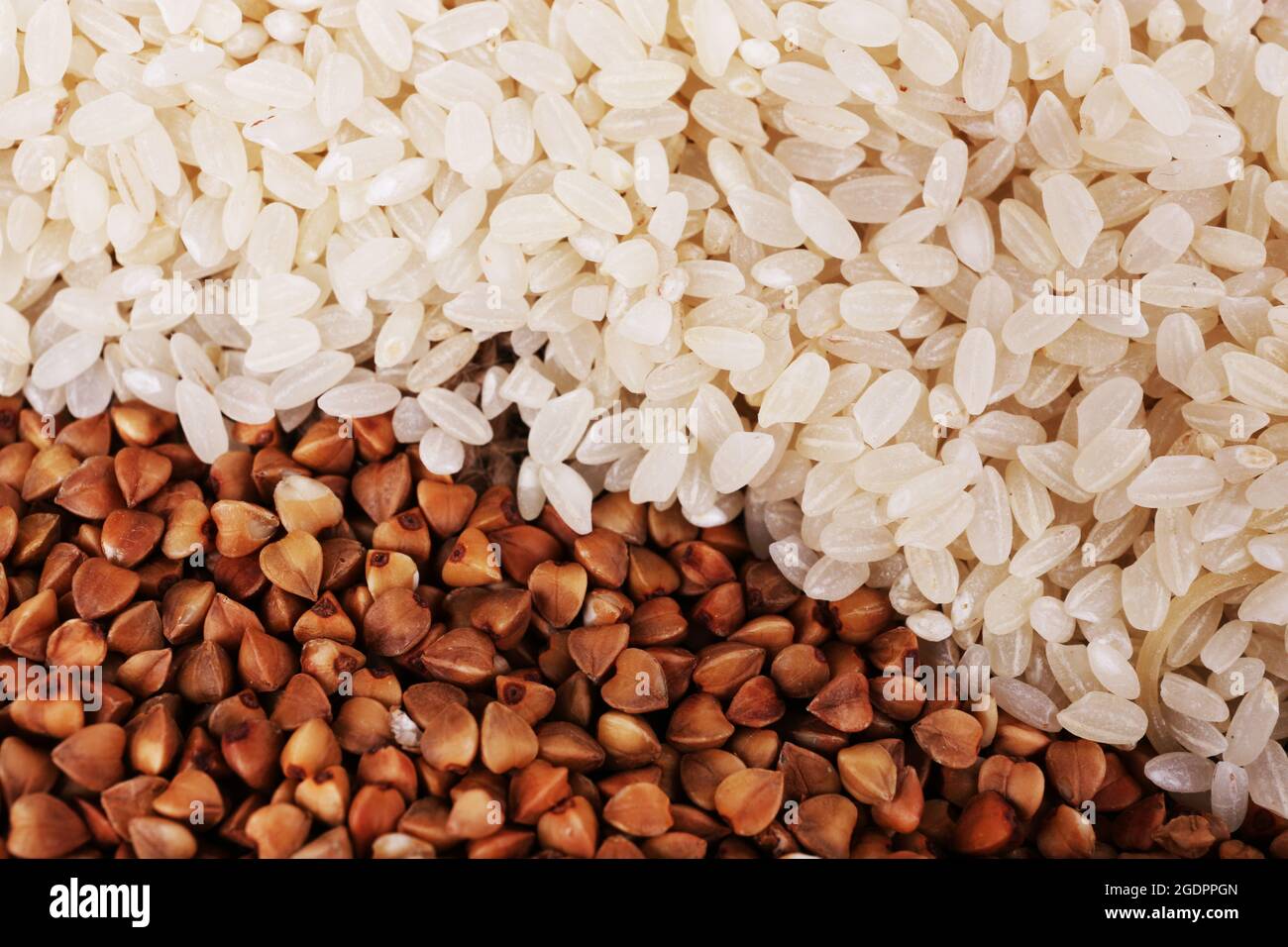 Rice and buckwheat as background Stock Photo - Alamy