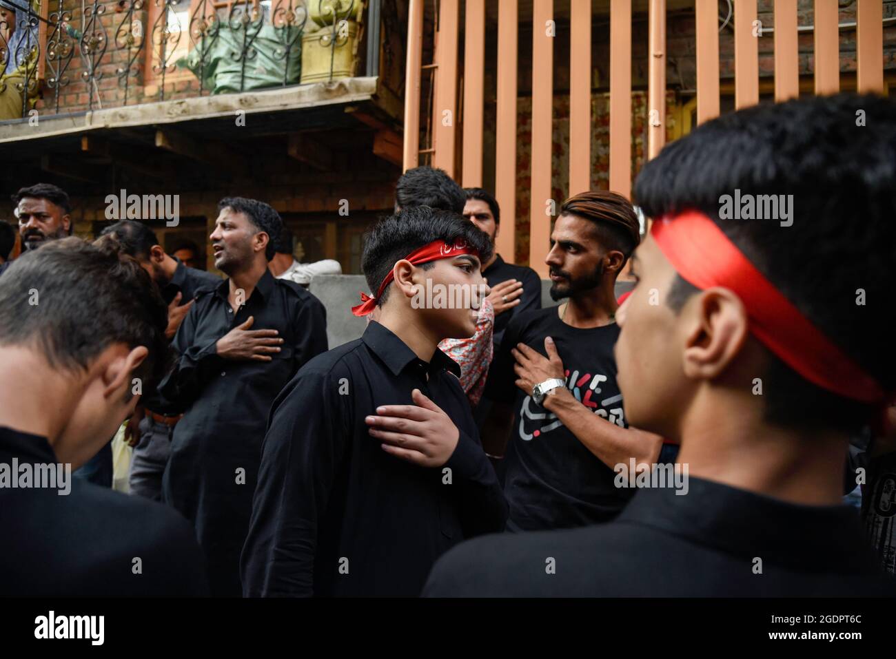 Srinagar, India. 14th Aug, 2021. Kashmiri Shia Muslims beat their ...