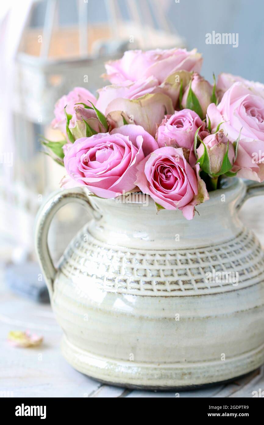 Bouquet of pink roses. Party decor Stock Photo - Alamy