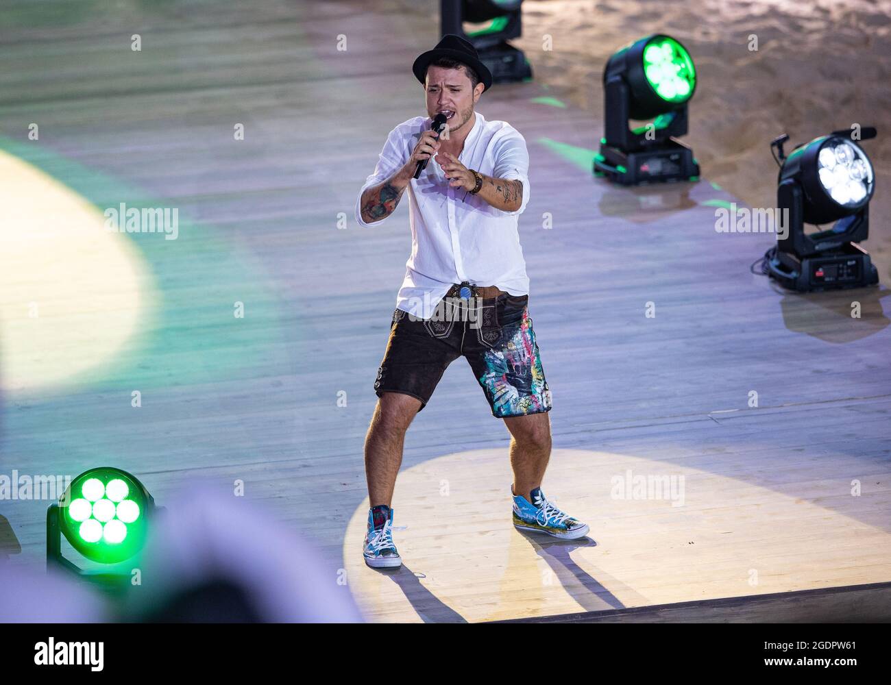 Gelsenkirchen, Germany. 14th Aug, 2021. Singer Max Weidner is on stage ...