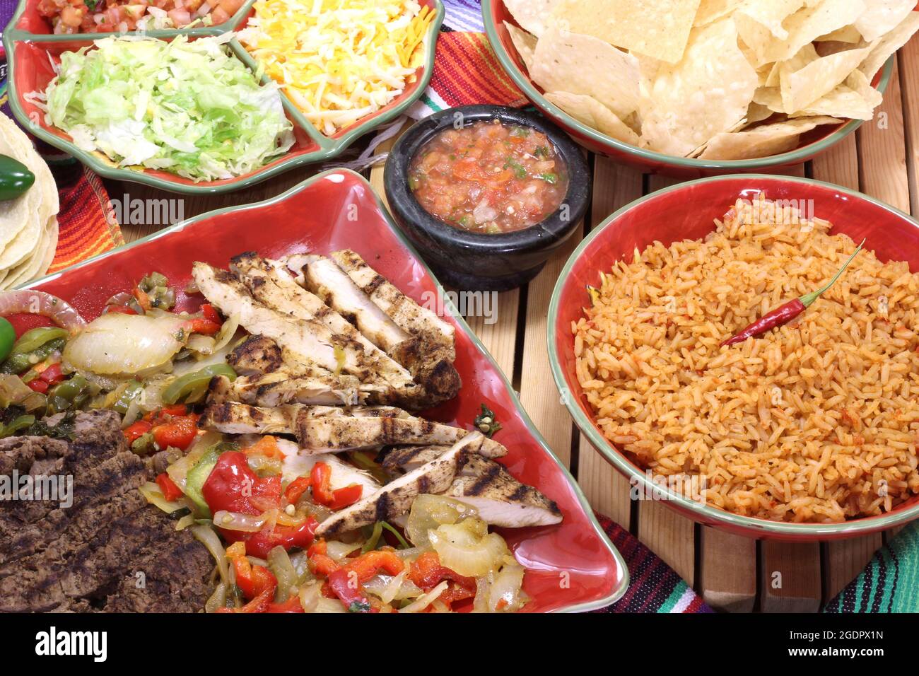 Fajita Dinner With Rice and Tortillas in Rustic Setting Stock Photo - Alamy