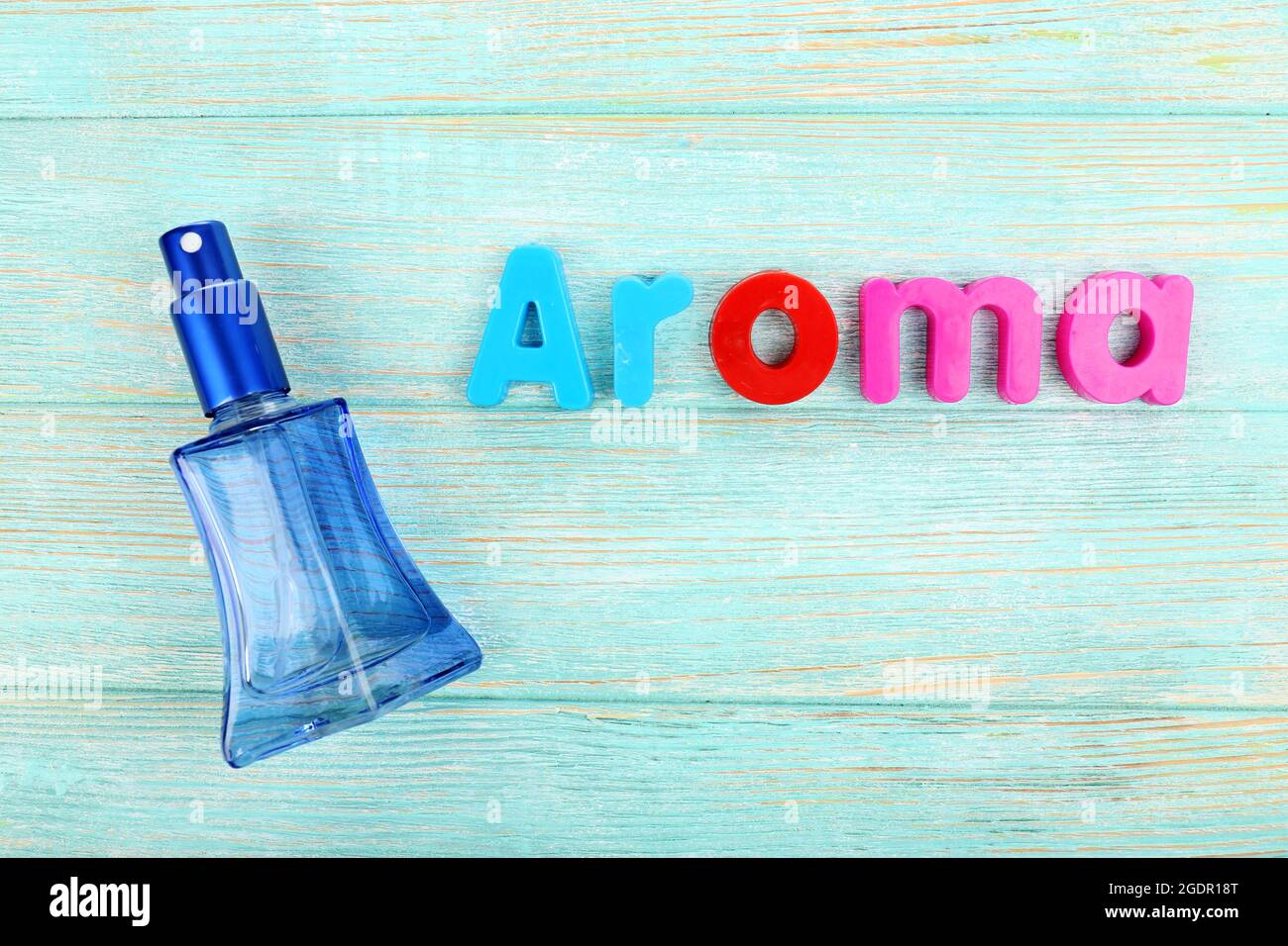 Aroma word formed with colorful letters on wooden background Stock ...