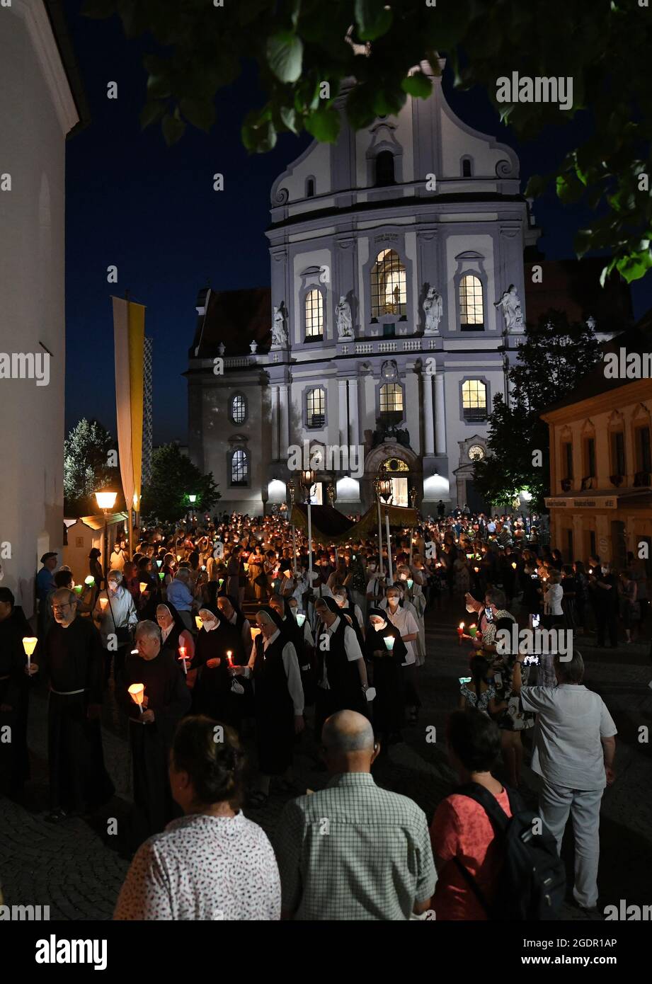 14 August 2021, Bavaria, Altötting: During a candlelight procession on ...