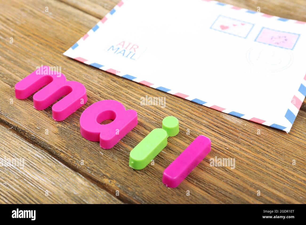 Mail word formed with colorful letters on wooden background Stock Photo ...