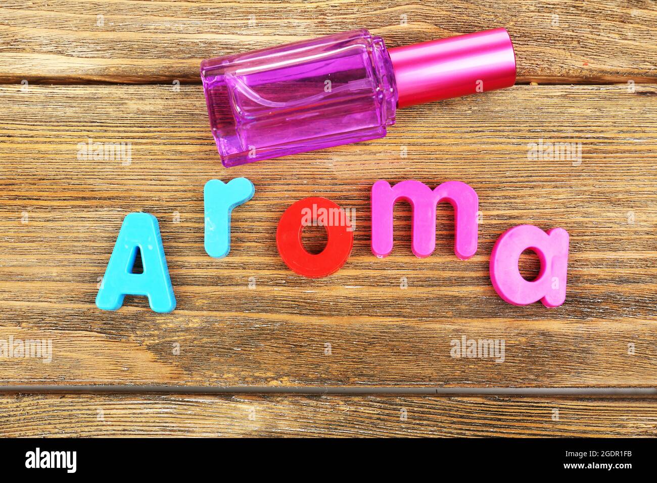 Aroma word formed with colorful letters on wooden background Stock ...