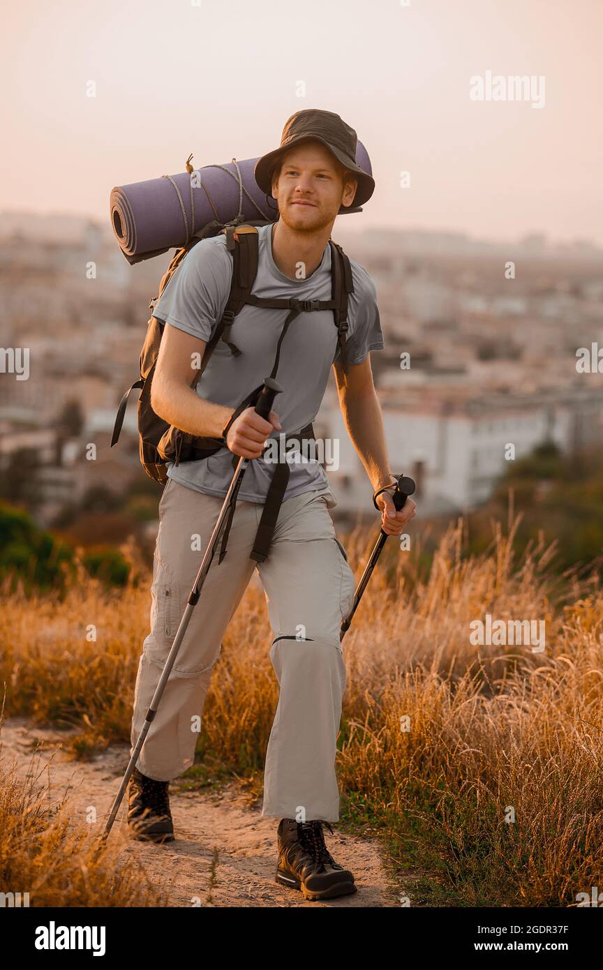 A hiker. A picture of a man hiking and enjoying nature Stock Photo - Alamy
