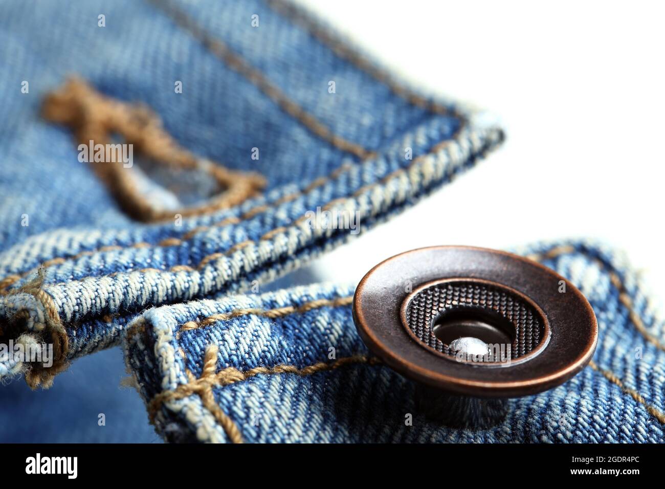 Button on clothes close up Stock Photo - Alamy