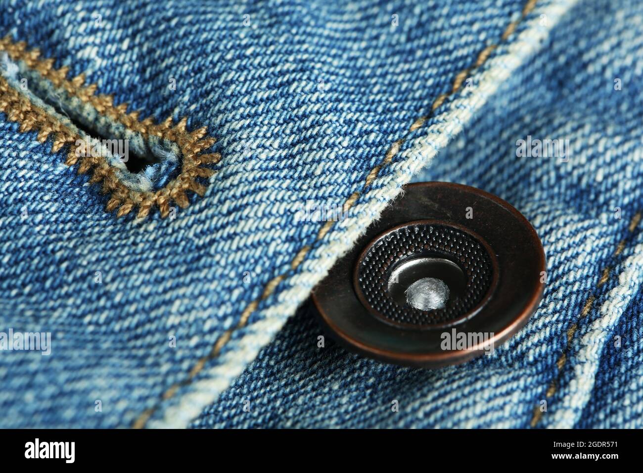 Button on clothes close up Stock Photo - Alamy