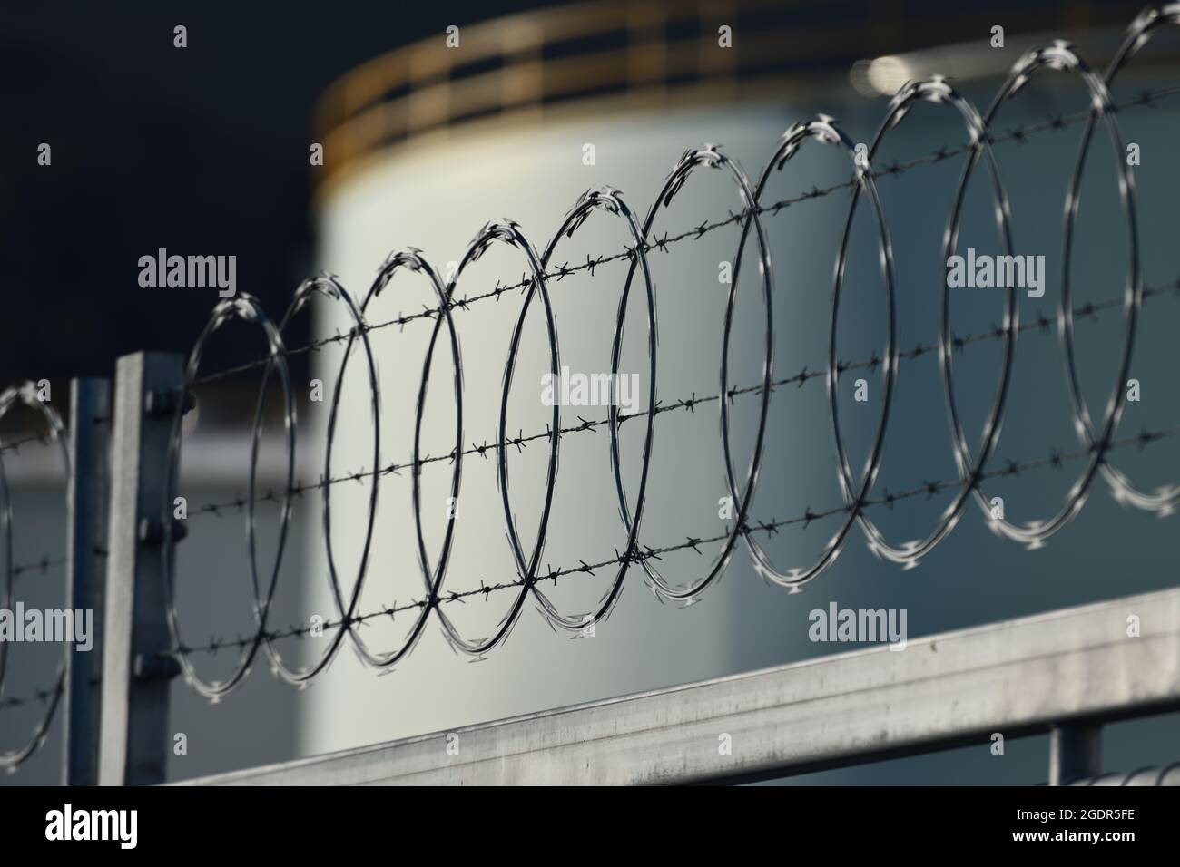 razorwire at an industrial site creates a textured background Stock ...