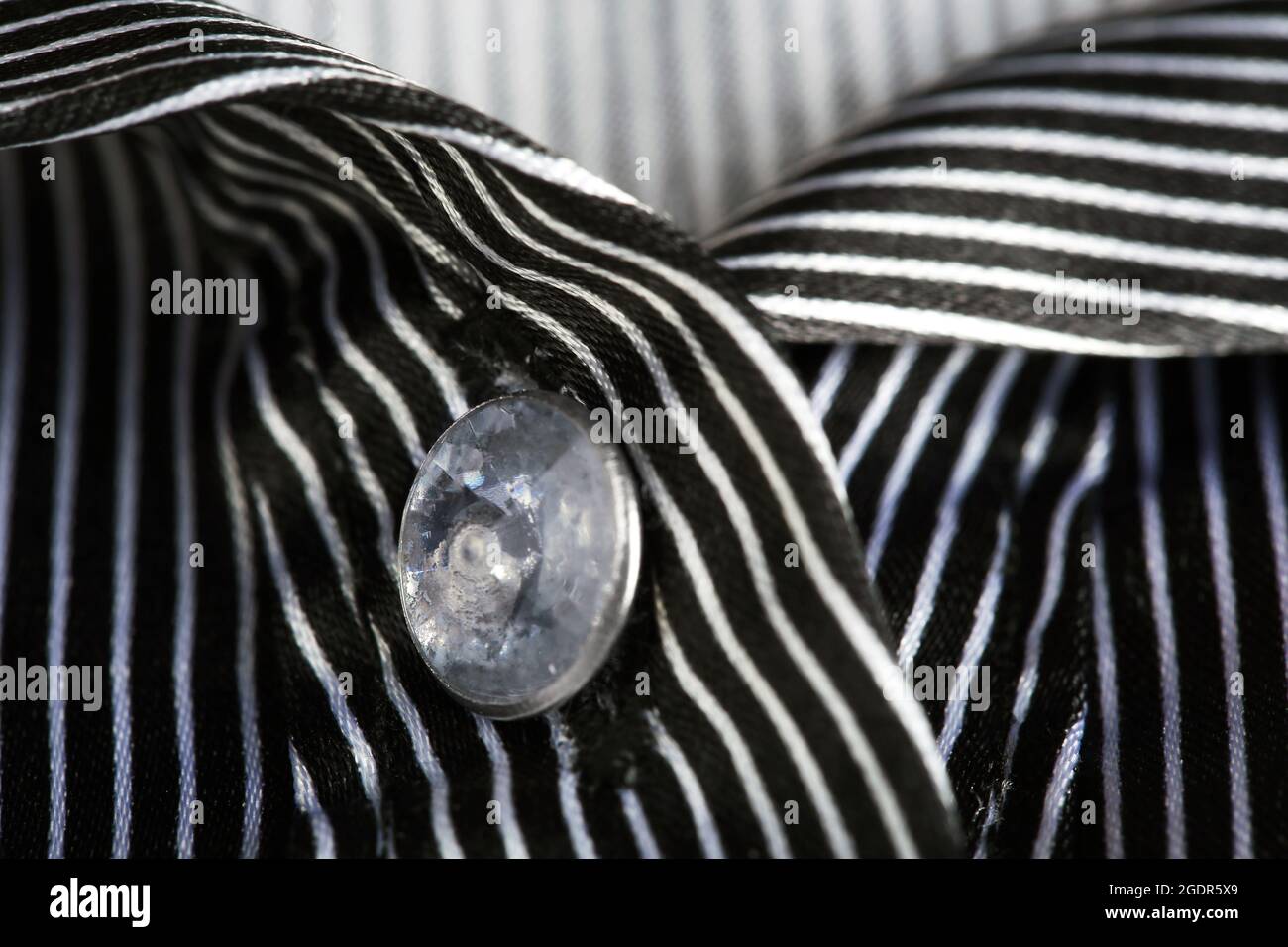 Button on clothes close up Stock Photo - Alamy