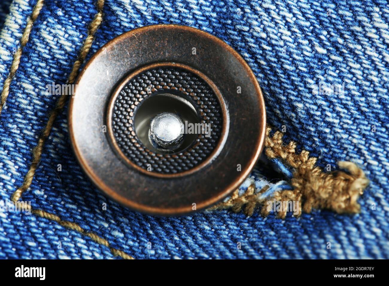 Button on clothes close up Stock Photo - Alamy