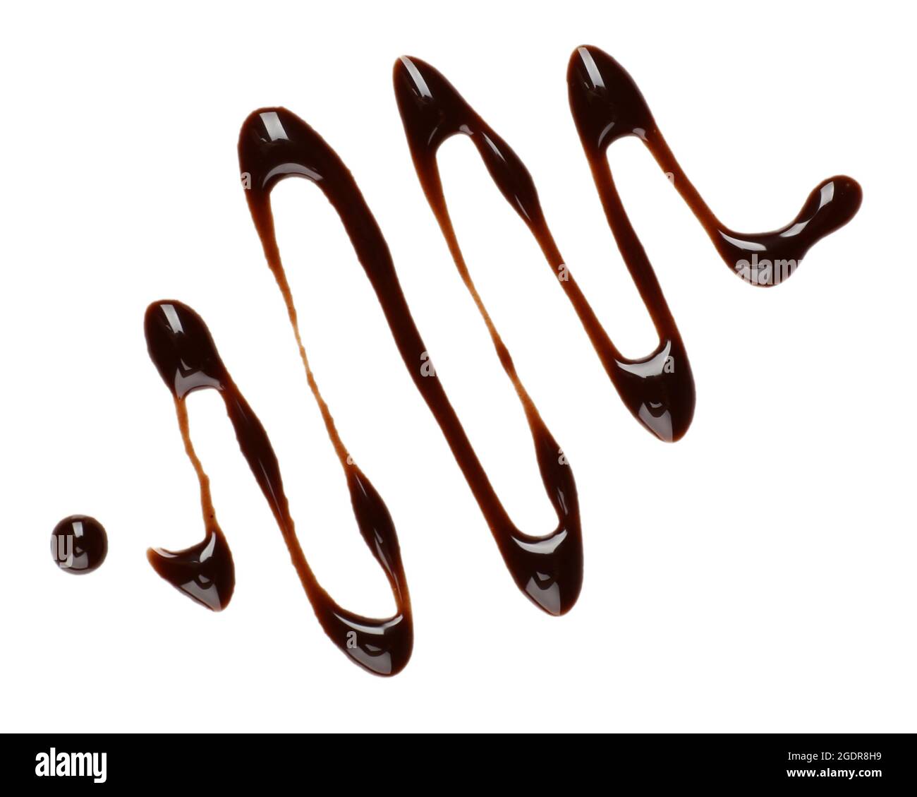 Chocolate syrup drips isolated on white hi-res stock photography and ...