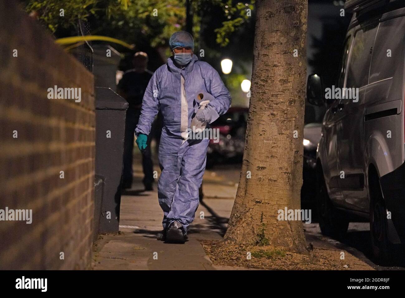 Forensic suit hi-res stock photography and images - Alamy
