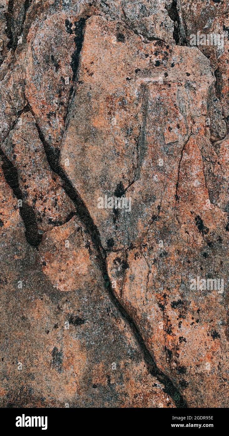 Vertical closeup shot of a stone textured surface Stock Photo - Alamy