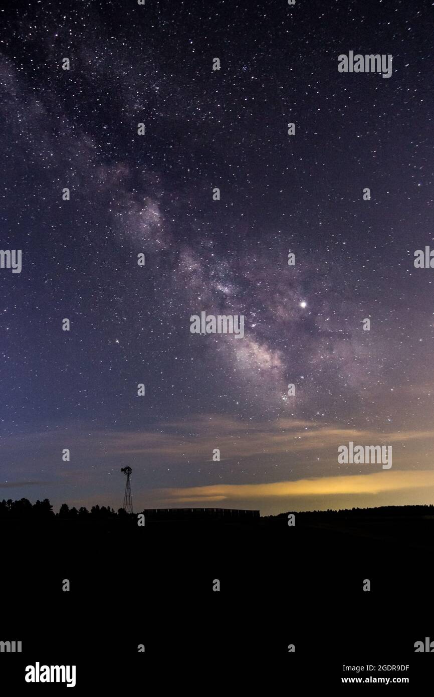 The Milky Way rises brilliantly above a ranch in eastern Colorado on a ...