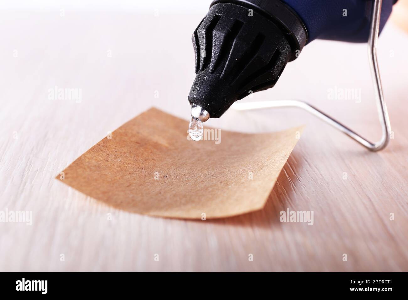 Making postcard with a help of glue gun Stock Photo - Alamy