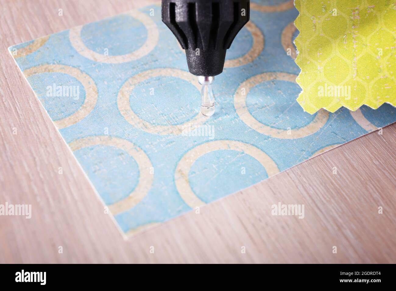 Making postcard with a help of glue gun Stock Photo - Alamy