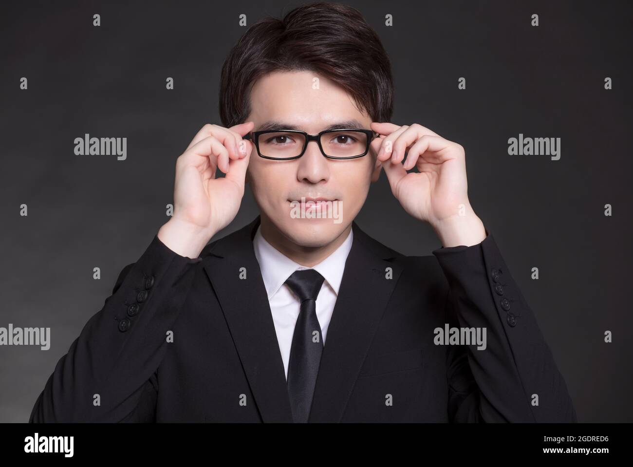 Young black man wearing suit hi-res stock photography and images - Alamy