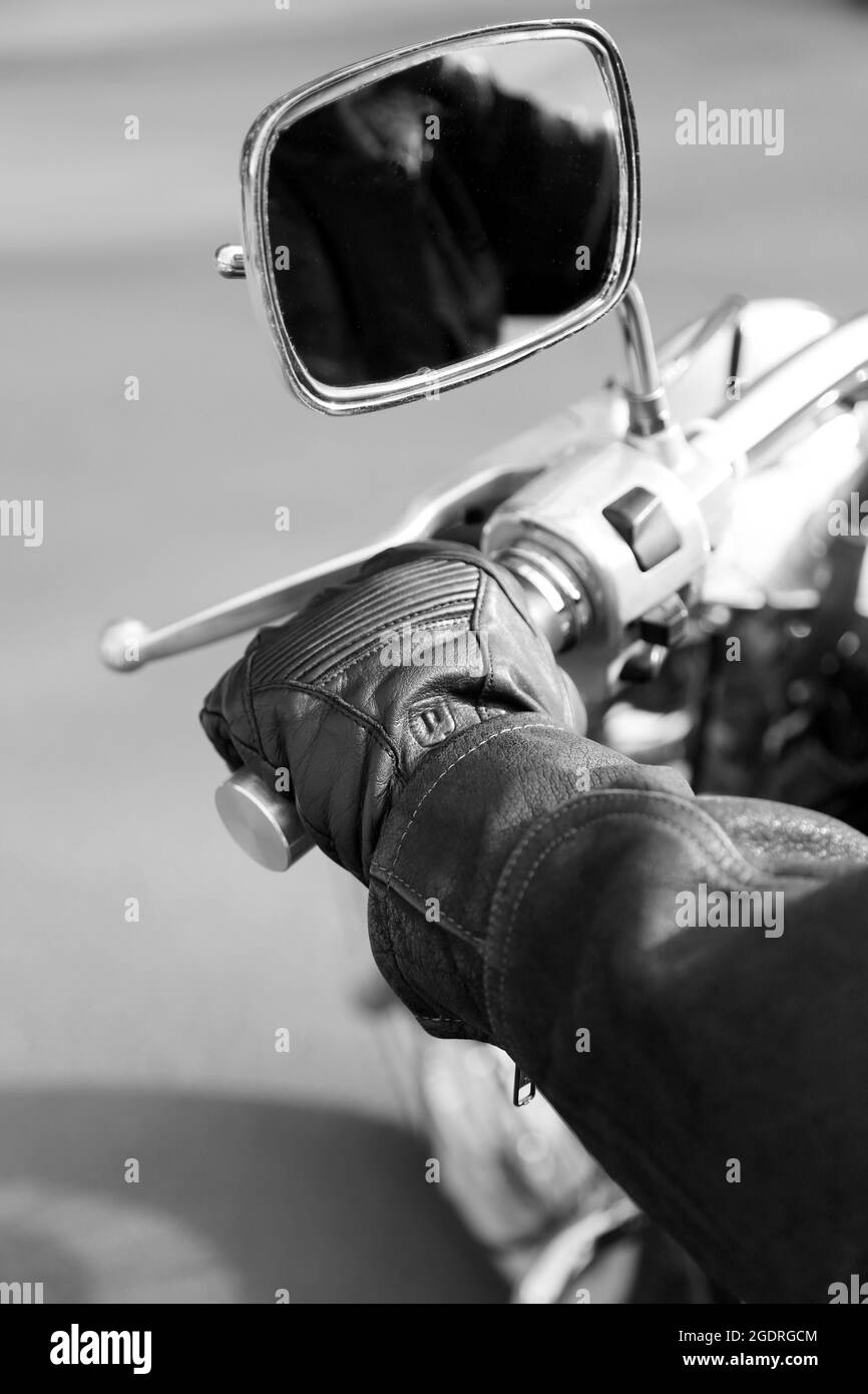 Hand rider on handlebars, close-up Stock Photo - Alamy
