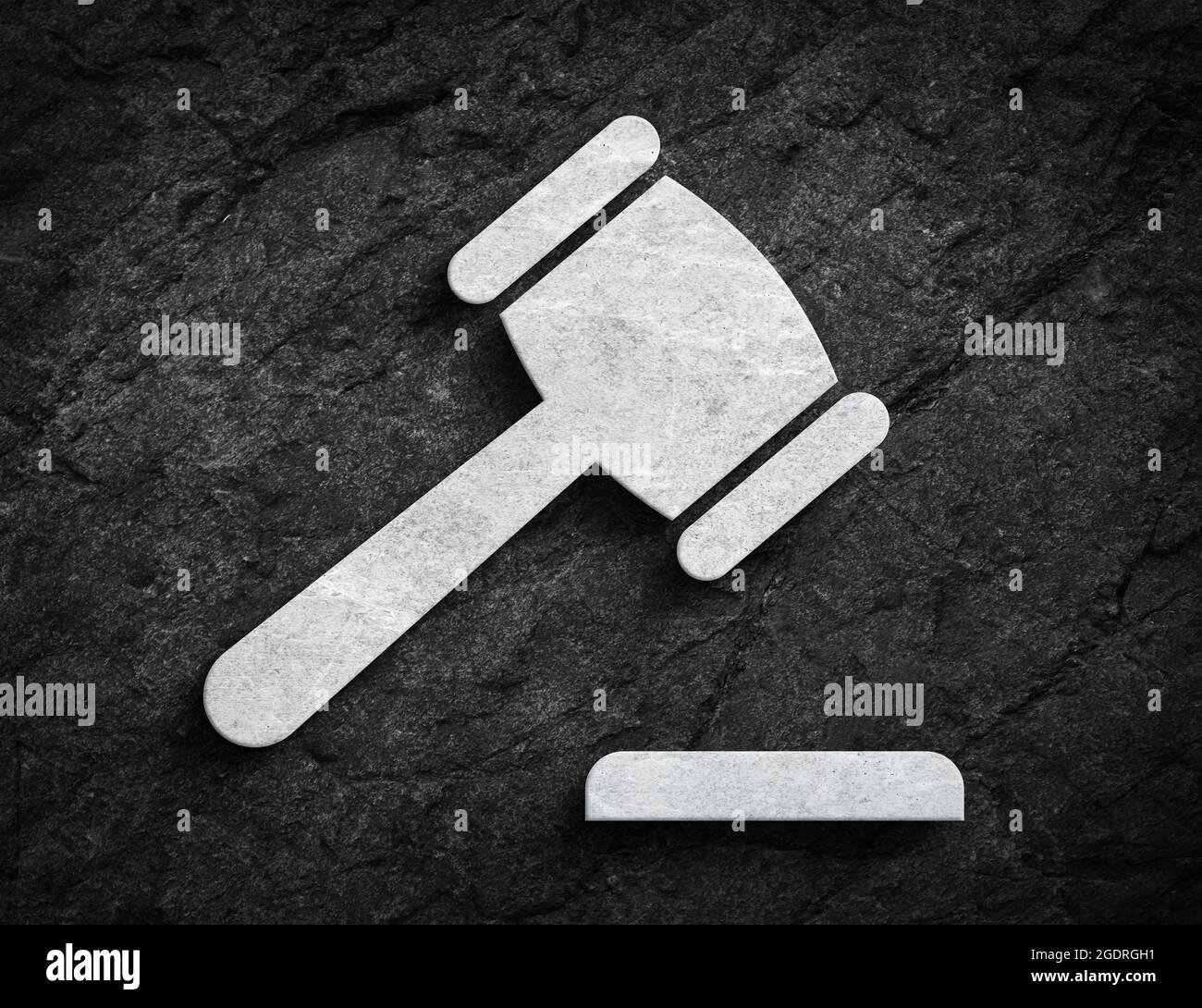 A judge court or justice gavel symbol on dark stone wall background ...