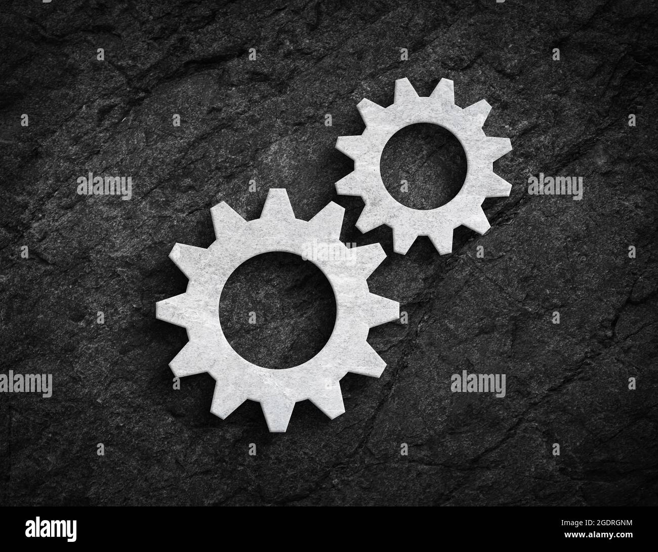 White stone gear symbol for repair maintenance or mechanism symbol on ...