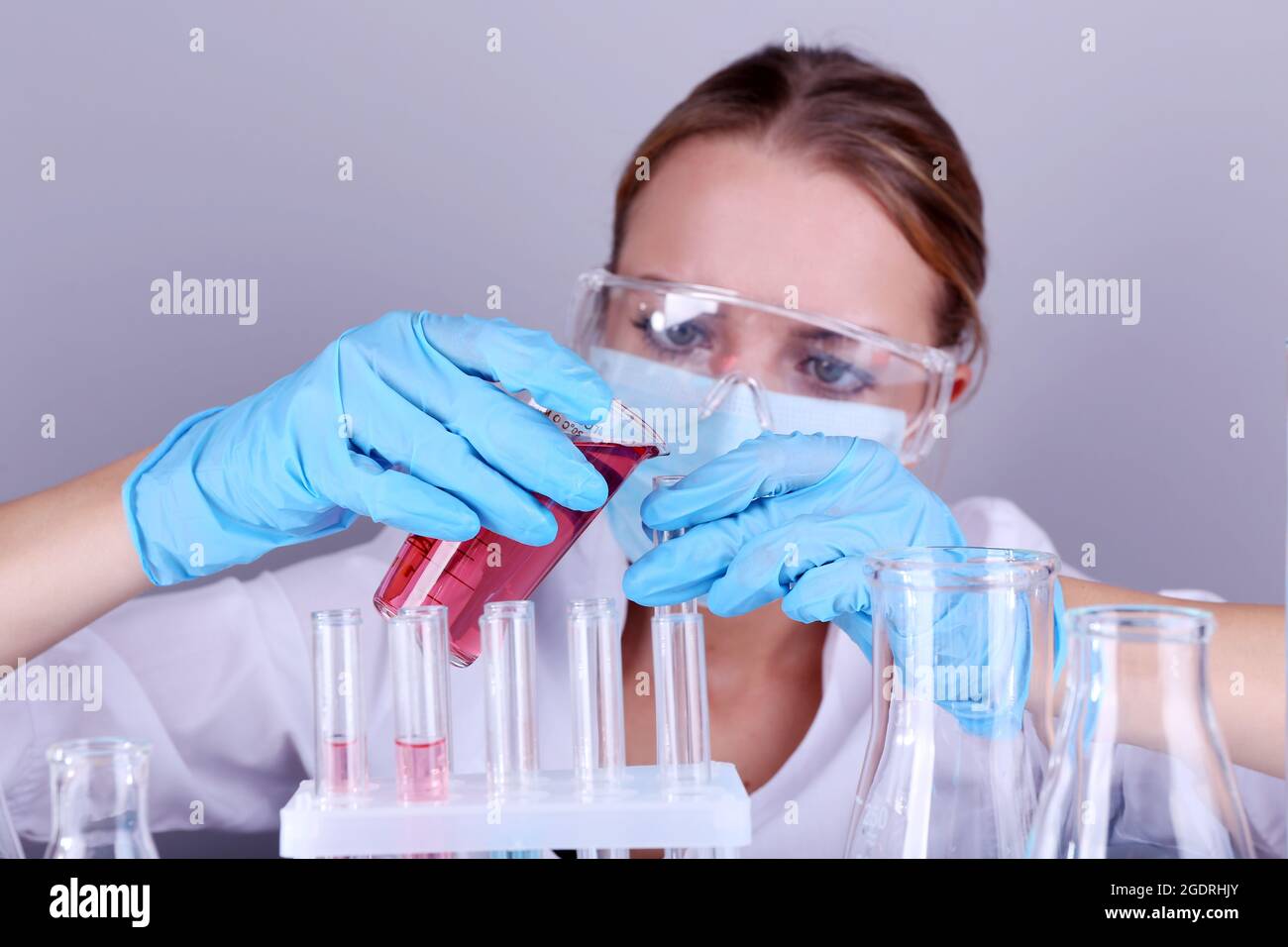 Laboratory assistant making medical test in laboratory Stock Photo - Alamy