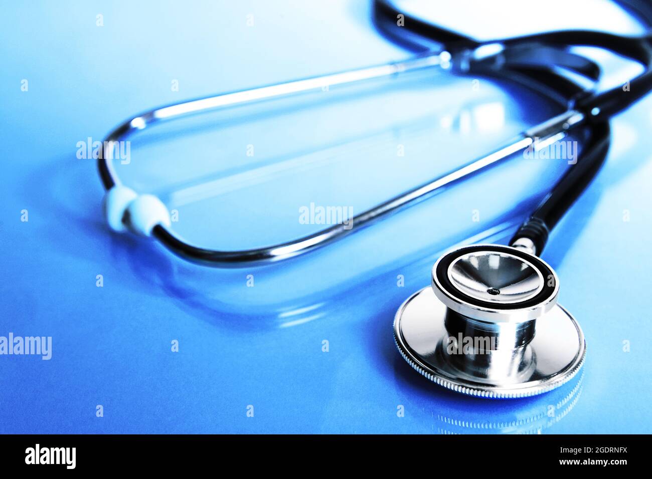 Stethoscope on light blue background Stock Photo - Alamy