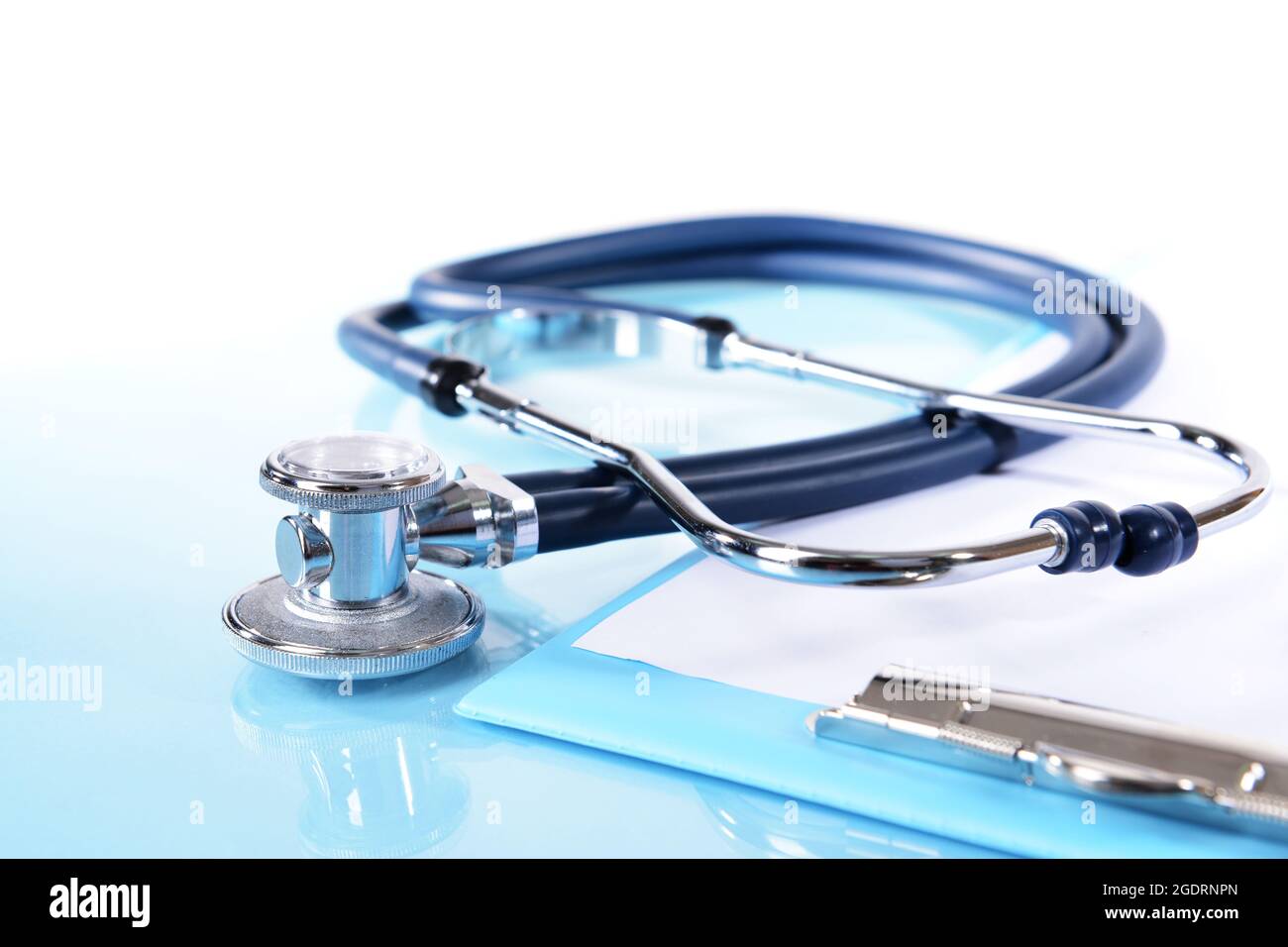 Stethoscope on light blue background Stock Photo - Alamy