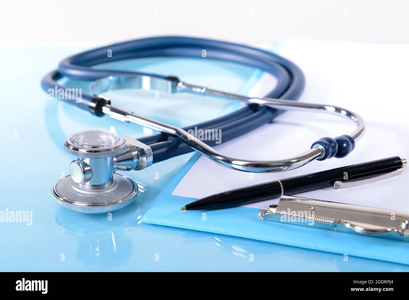 Stethoscope on light blue background Stock Photo - Alamy