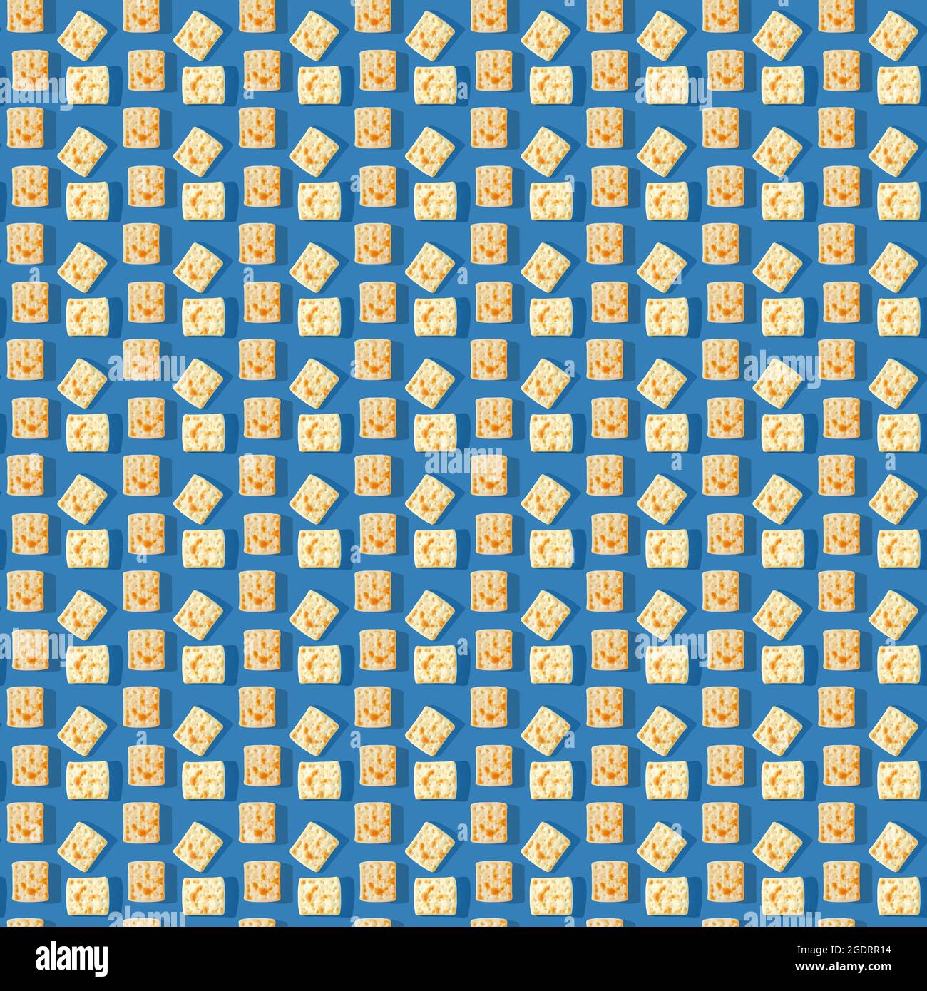 Photo in the form of a seamless pattern. Yellow-brown biscuits with ...
