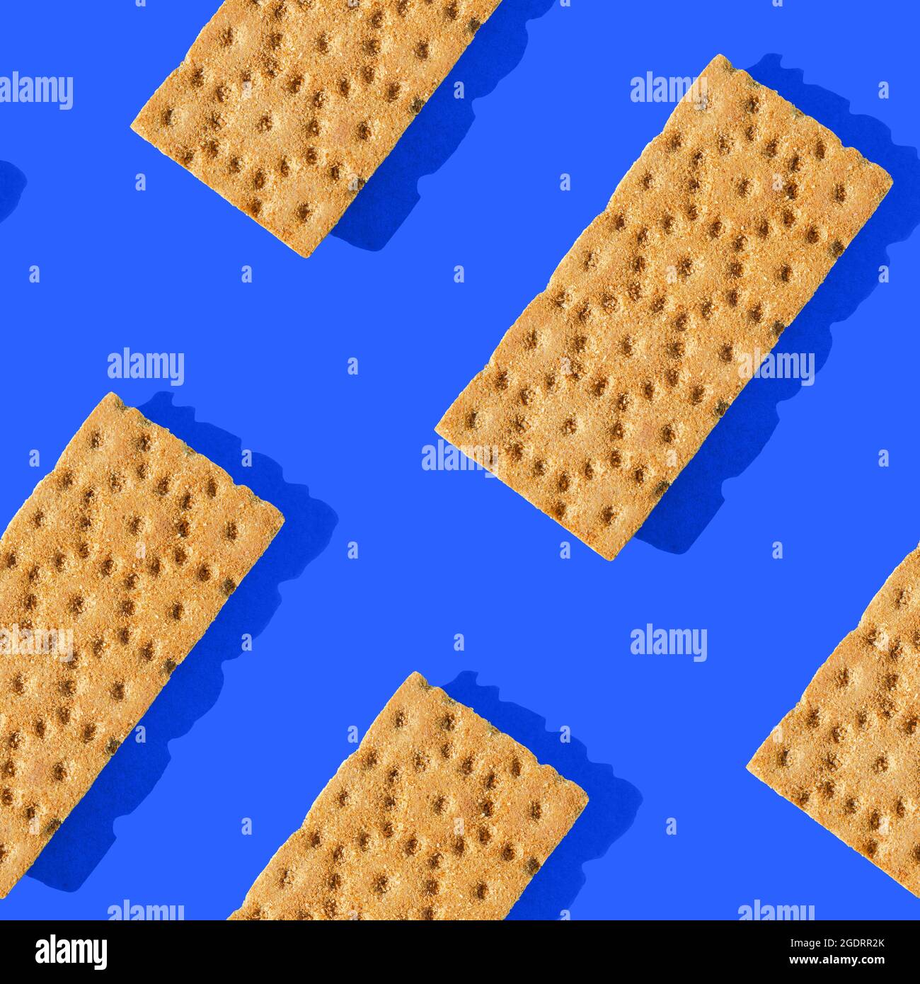 Photo in the form of a seamless pattern. Orange color crisps for ...