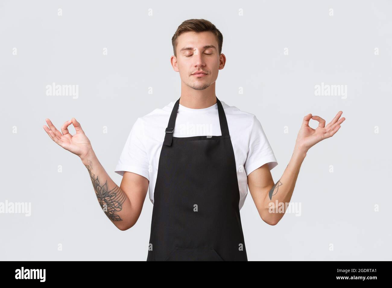 Employees, grocery stores and coffee shop concept. Determined and calm ...
