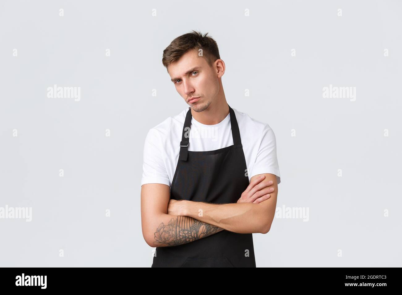 Employees, grocery stores and coffee shop concept. Serious bothered and ...