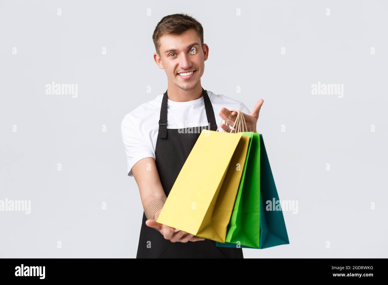 Handing bags hi-res stock photography and images - Alamy