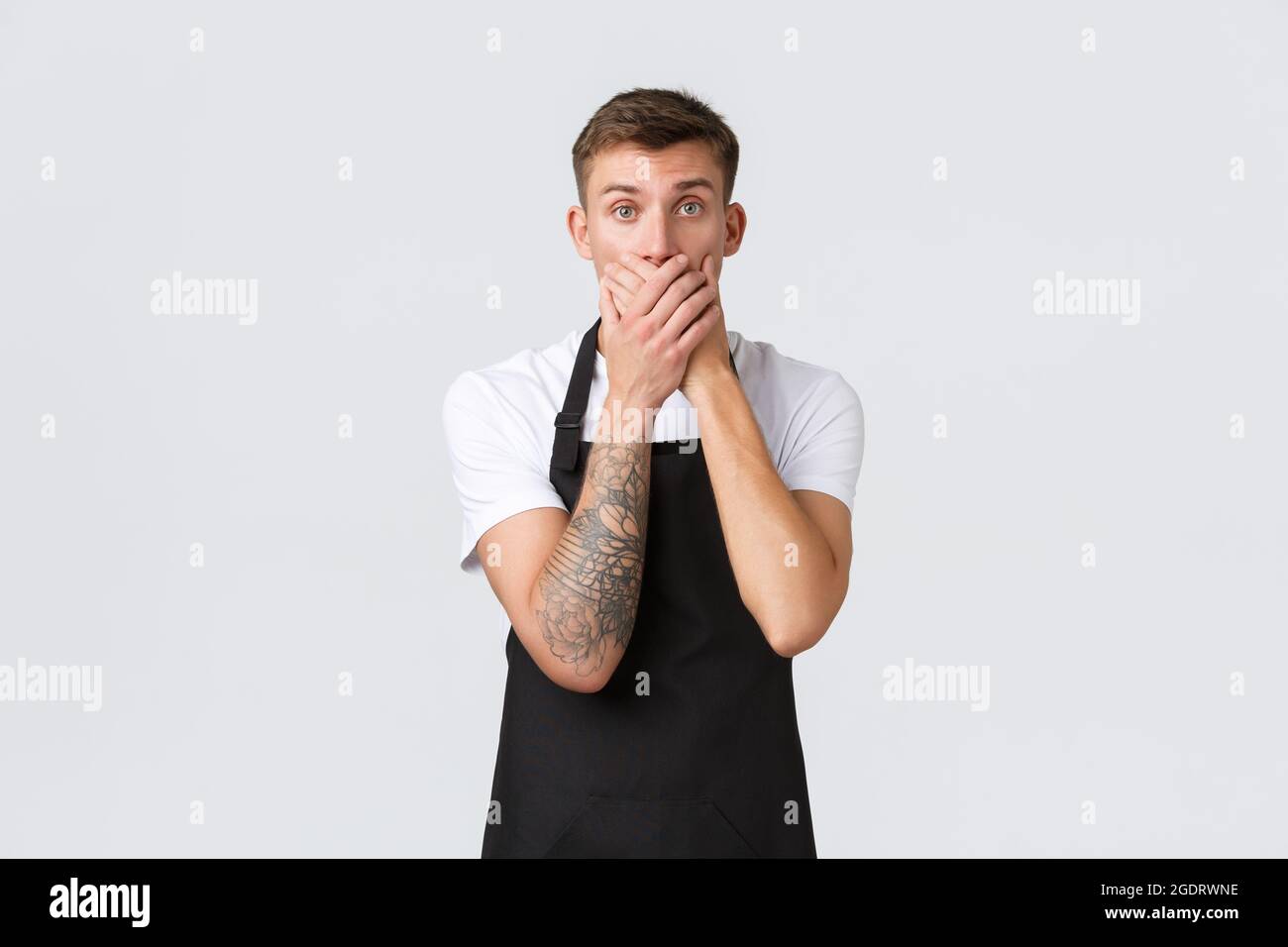 Employees, grocery stores and coffee shop concept. Shocked and ...