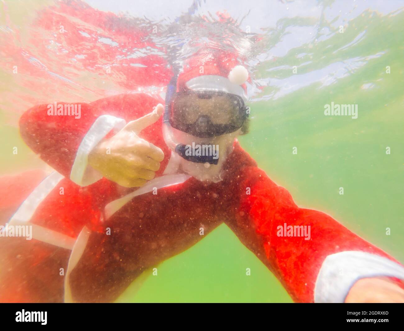 Santa claus is snorkeling underwater - christmas or happy new year ...
