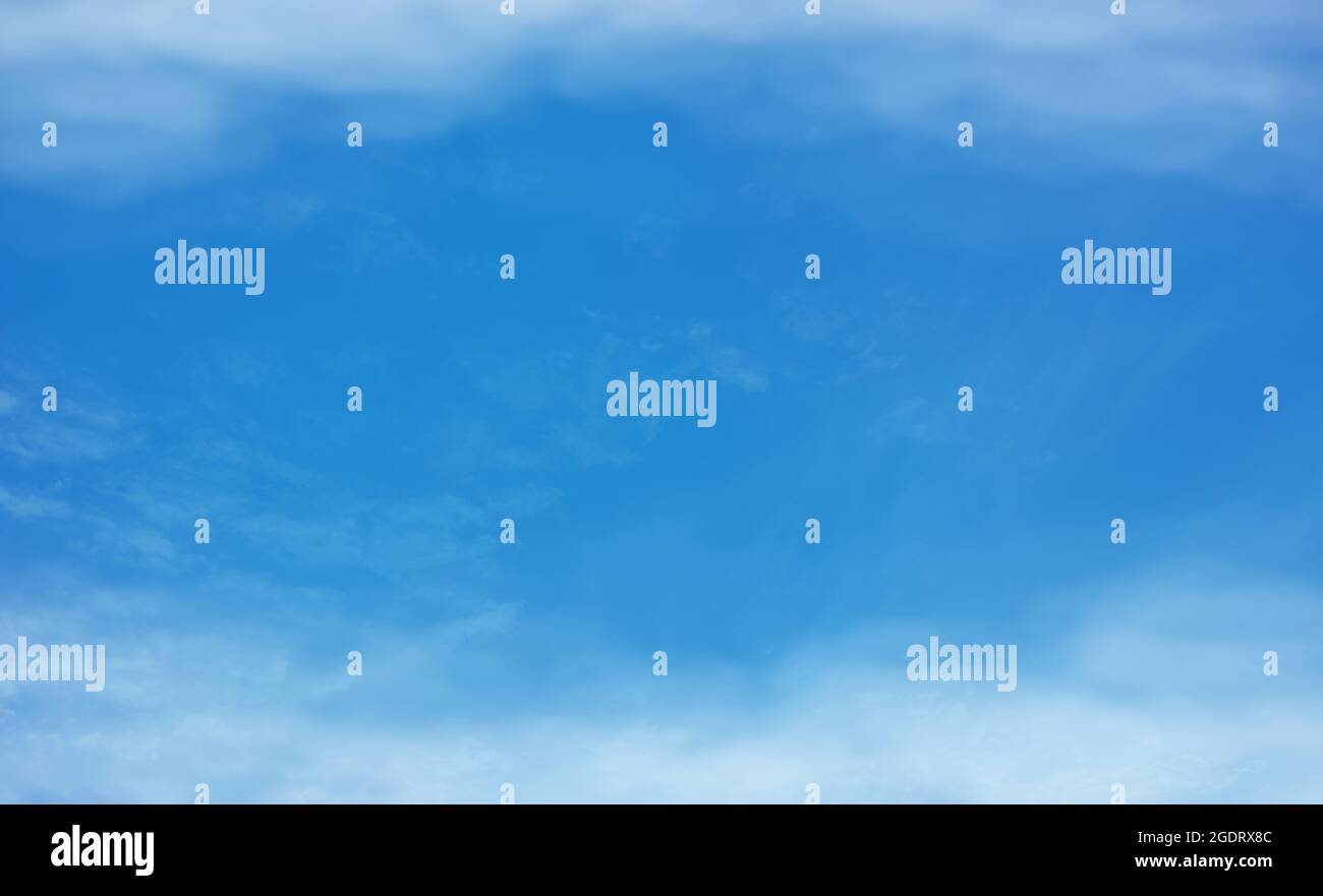 light blue sky background with thin moving clouds copy space Stock ...