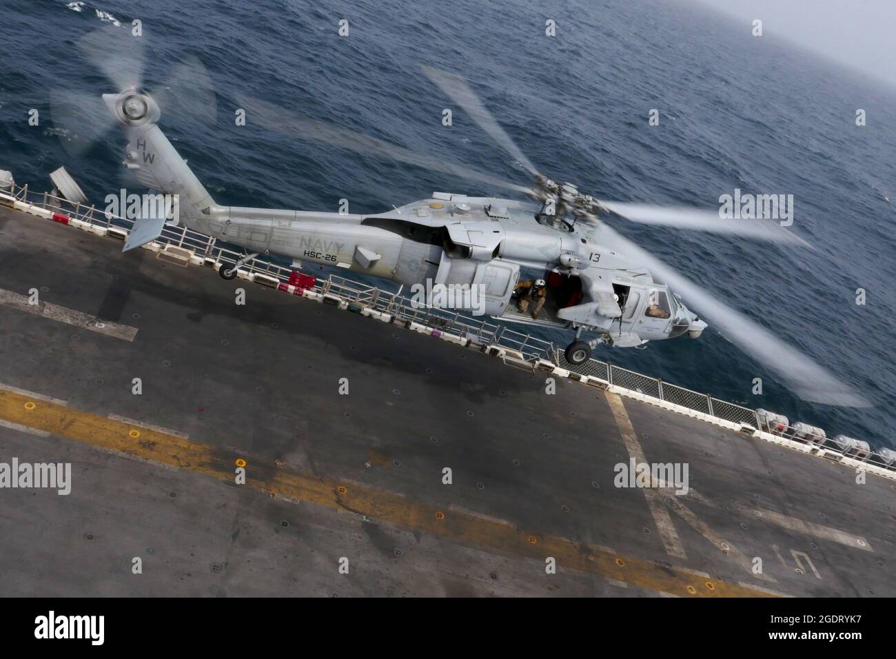 210813-N-WP865-1025 GULF OF OMAN (Aug. 13, 2021) An MH-60S Sea Hawk ...