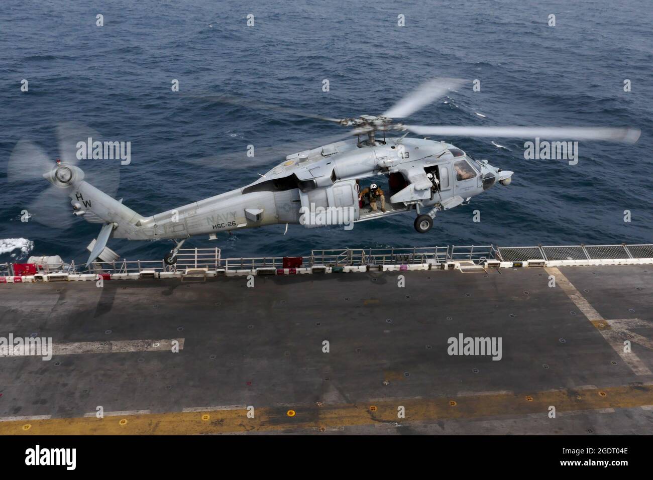 210813-N-WP865-1023 GULF OF OMAN (Aug. 13, 2021) An MH-60S Sea Hawk ...