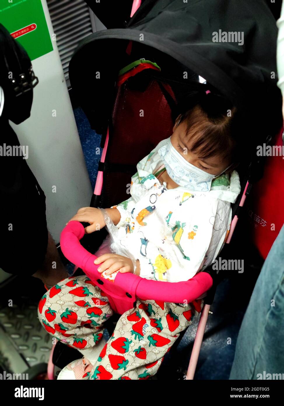 BEIJING, CHINA - AUGUST 13, 2021 - Passengers wearing face masks are ...