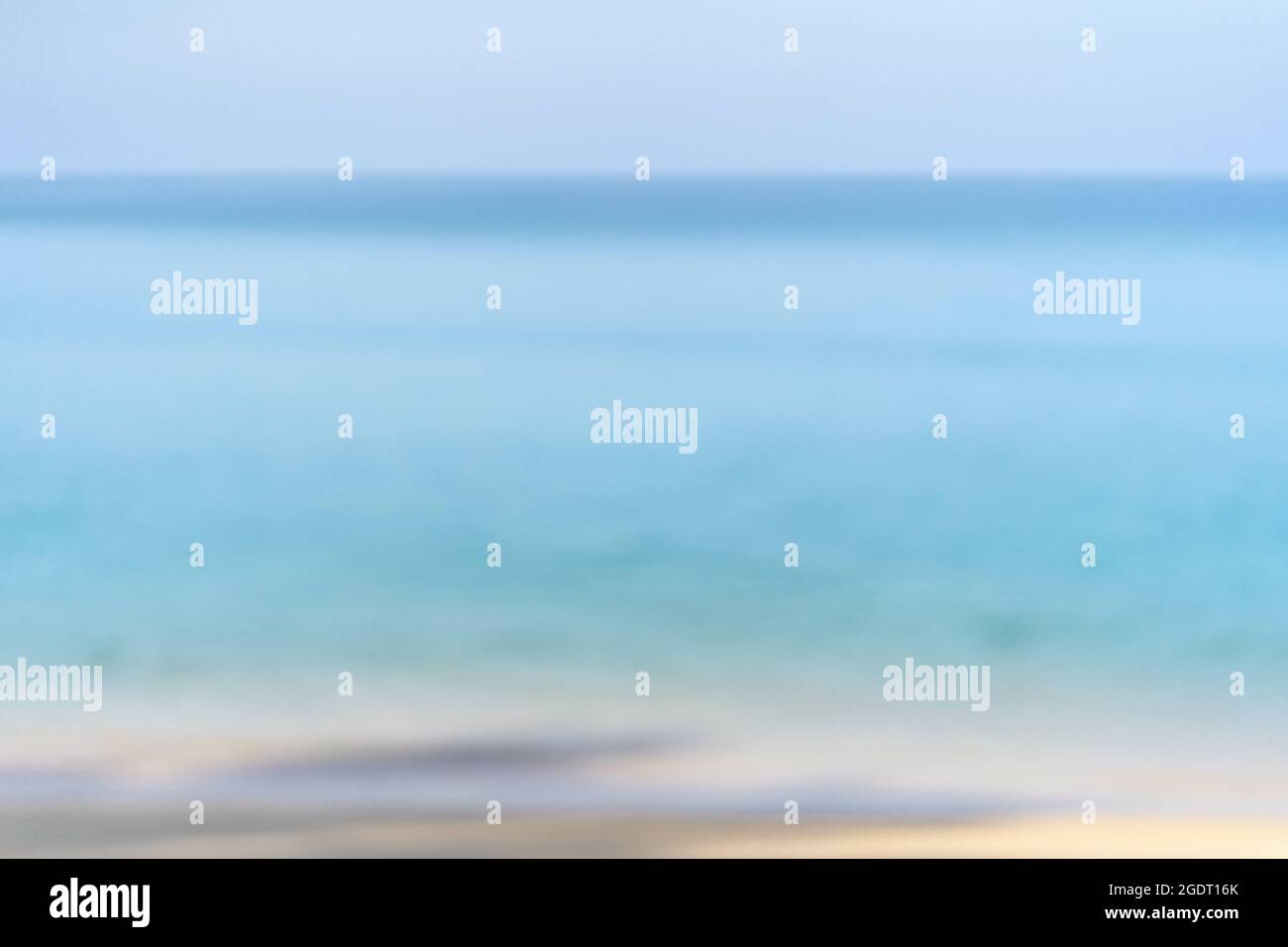 A blurred beach background - great for wallpaper Stock Photo - Alamy