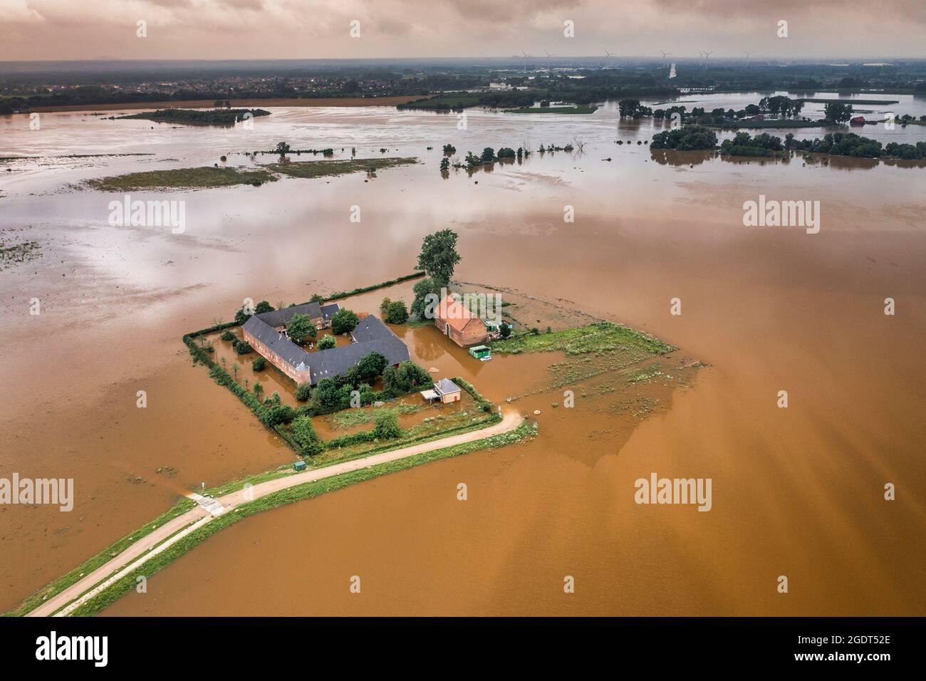 The Netherlands, Itteren. Flooded farm and farmland due to flooding of ...
