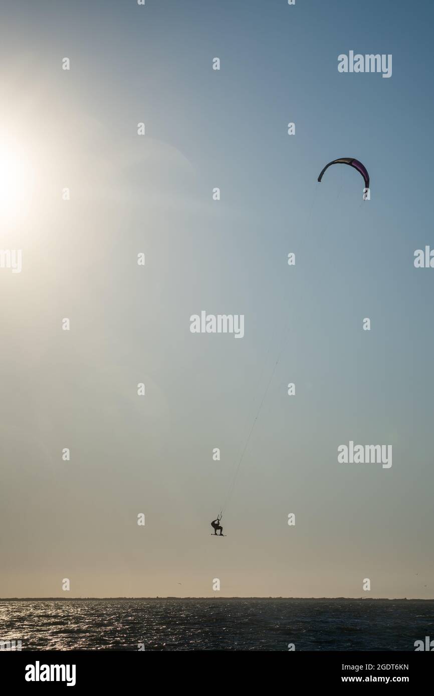 kite surfer catching air in the sea Stock Photo - Alamy