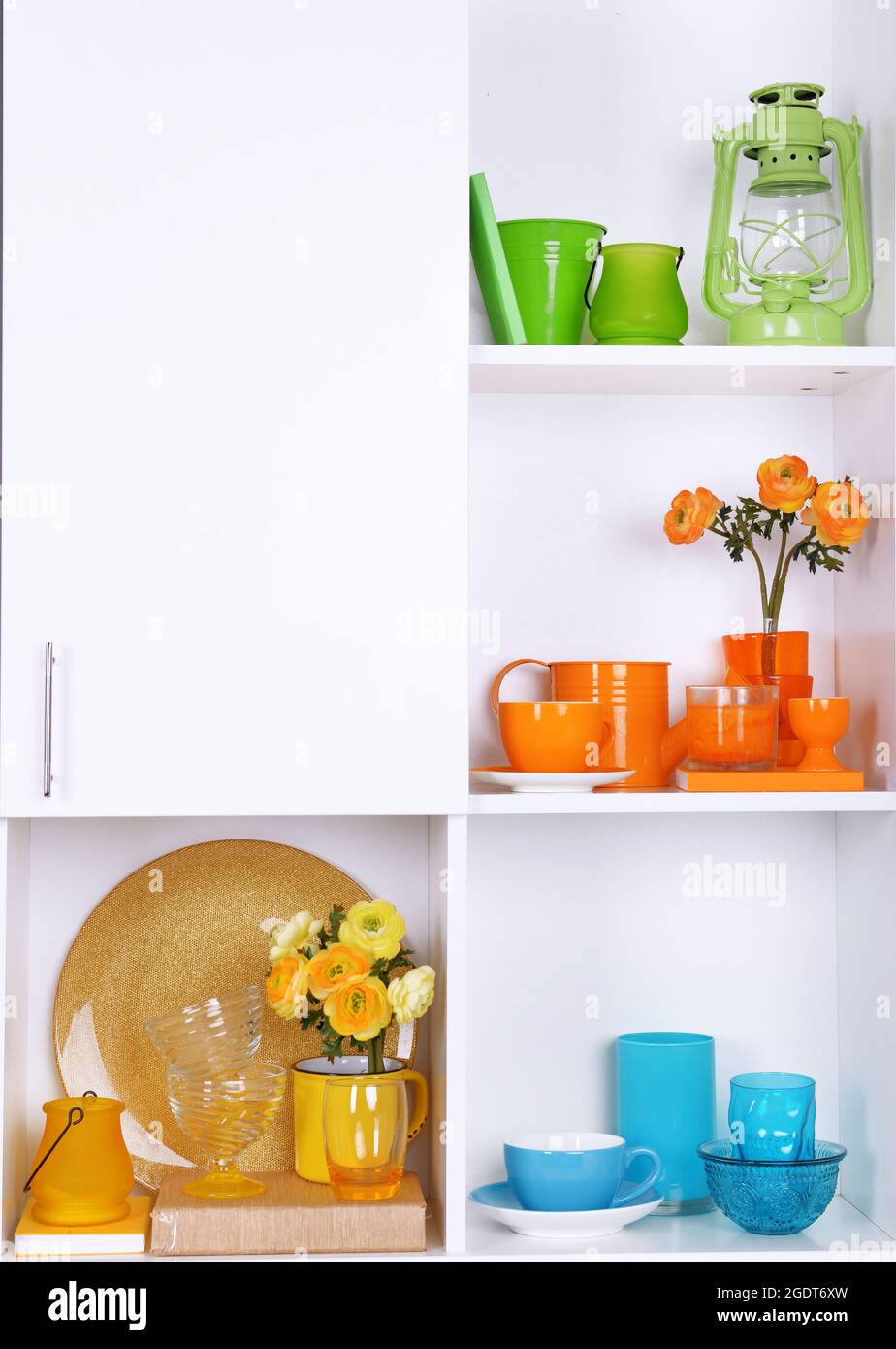 White shelves with colorful things, close-up Stock Photo - Alamy