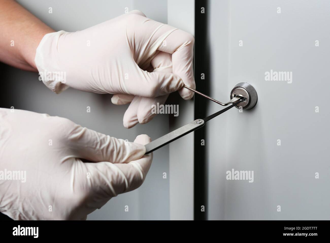 Picking a lock Stock Photo - Alamy