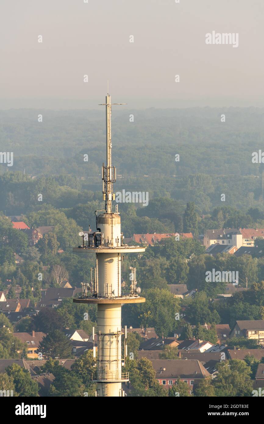 Tower, 5G mast for mobile networks and city in the background Stock ...