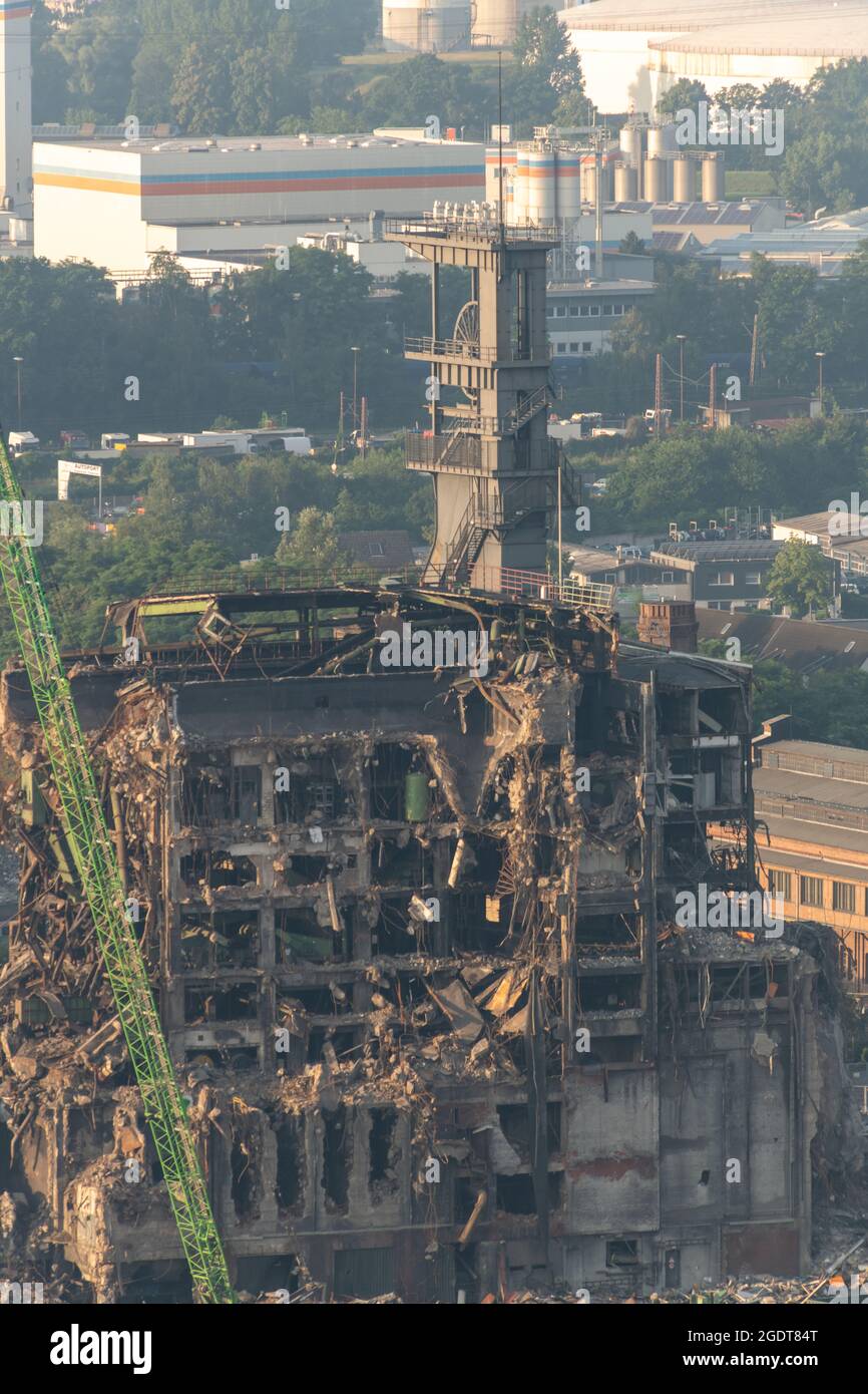Demolition of a power plant, ruin with winding tower in the background ...
